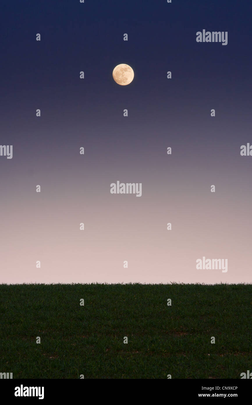 Full moon over field Stock Photo - Alamy