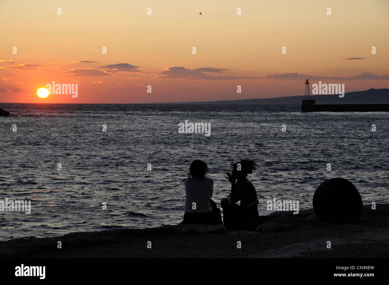 Watching sunsetting hi-res stock photography and images - Alamy