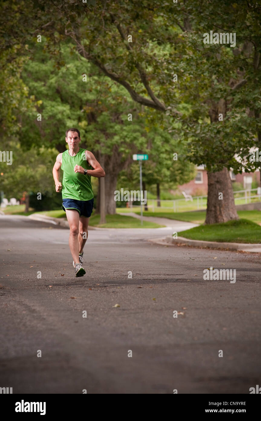Man running on dirt path Stock Photo - Alamy