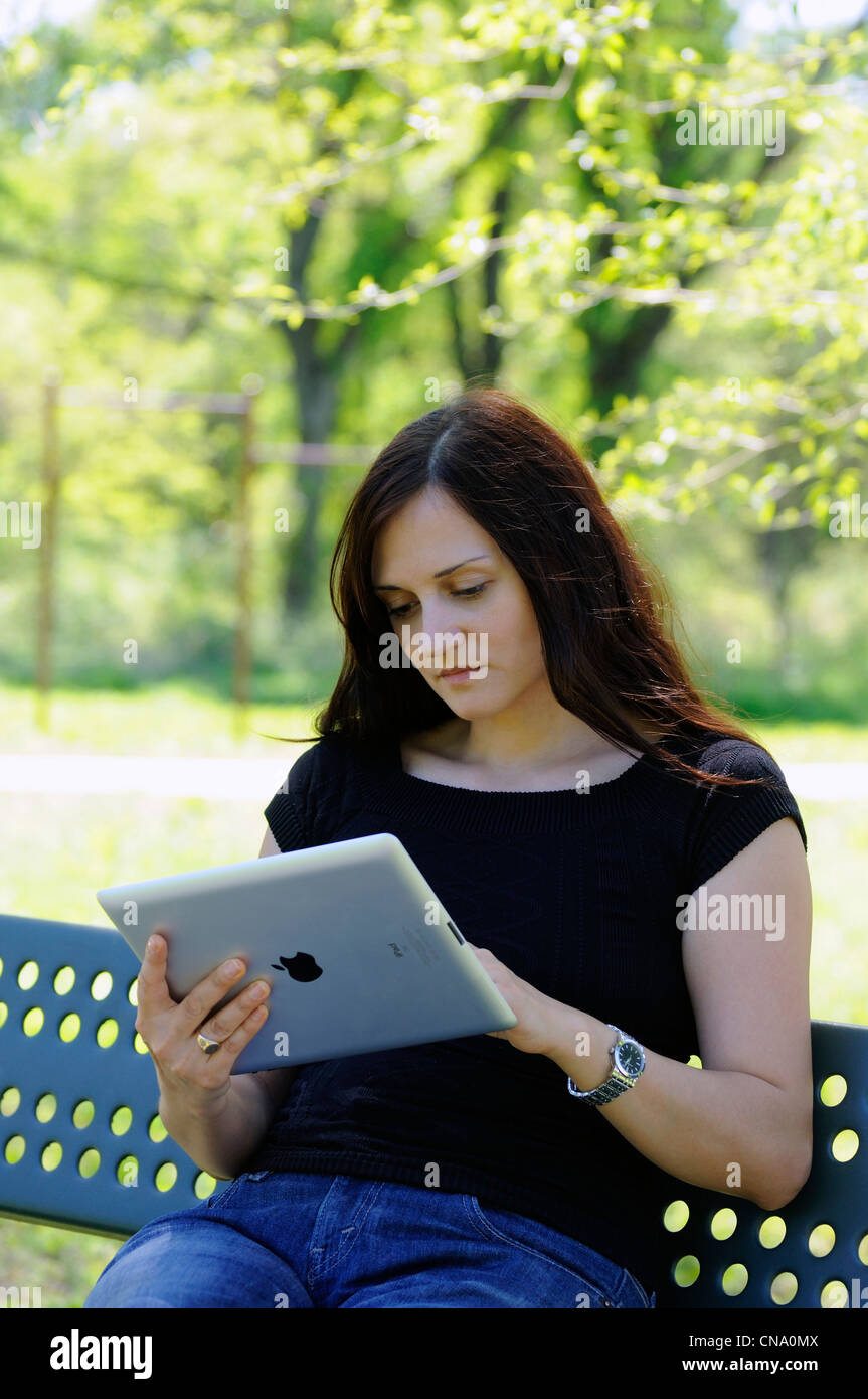 Girl with ipad Stock Photo - Alamy