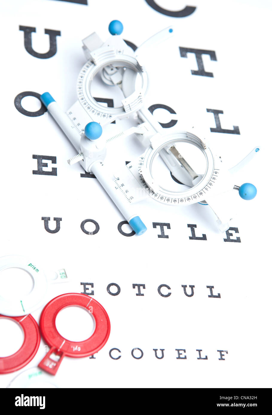 optometry concept - sight measuring spectacles & eye chart Stock Photo ...