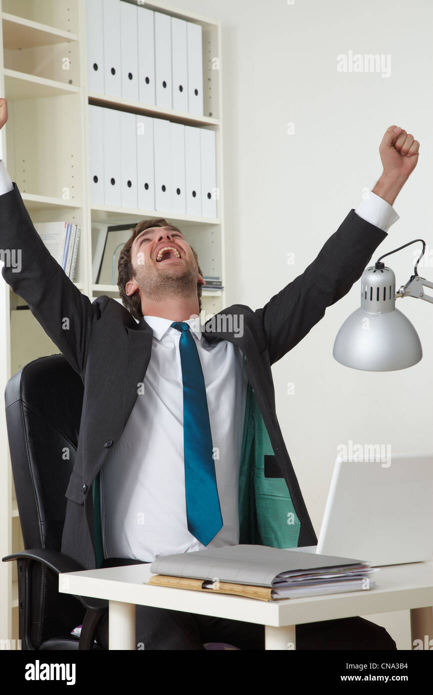 business man in office happy Stock Photo - Alamy