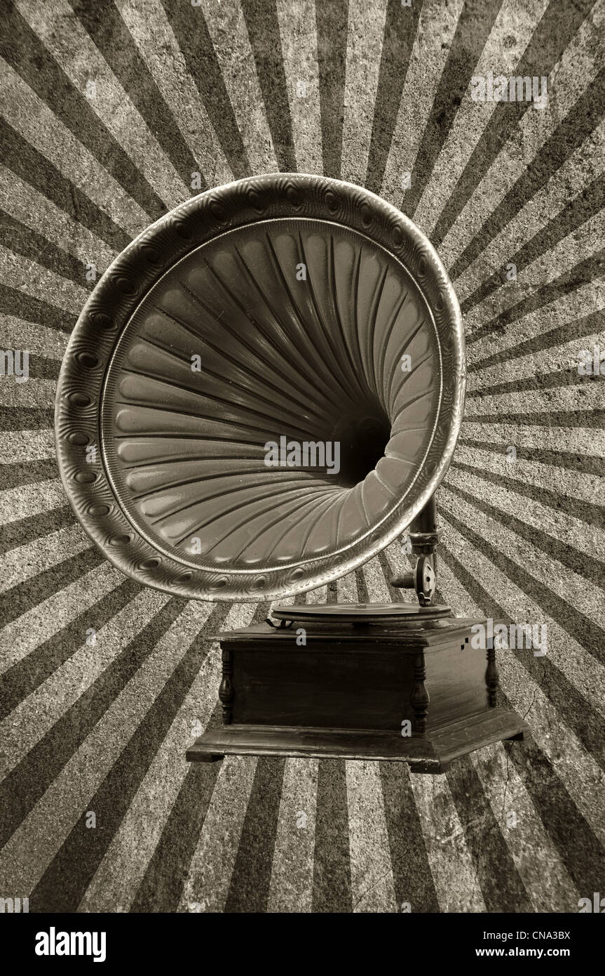 gramophone with horn speaker for playing music over a grungy background ...