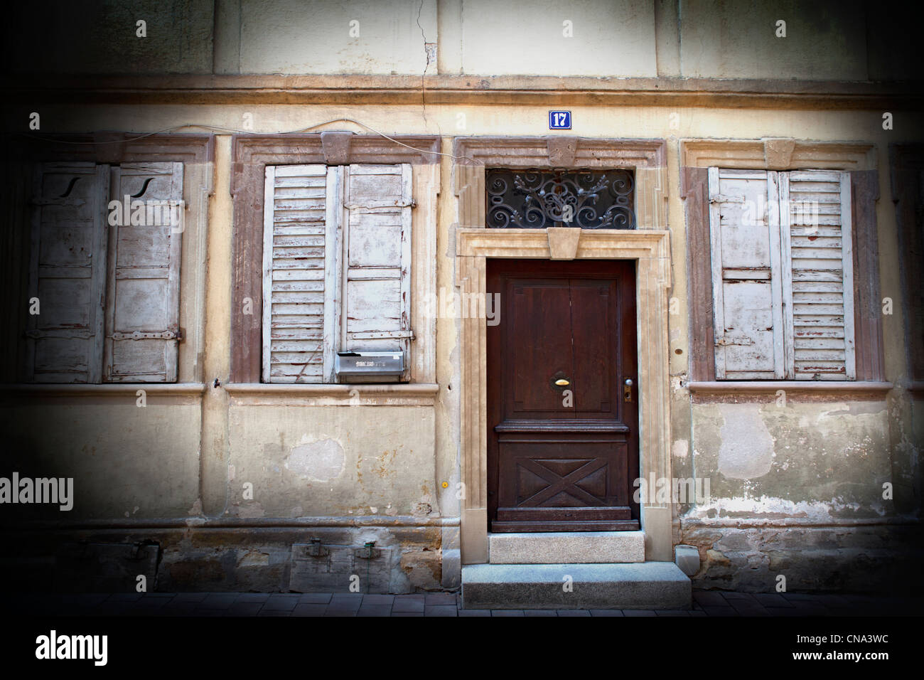 Street number 17 on broken broken house Stock Photo - Alamy