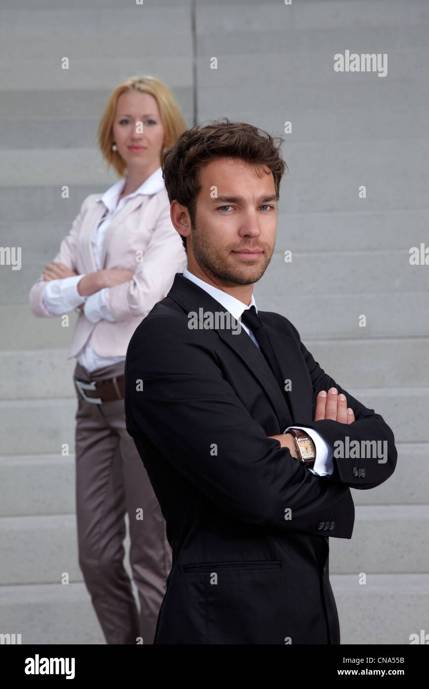 man and woman standing on stairs Stock Photo - Alamy
