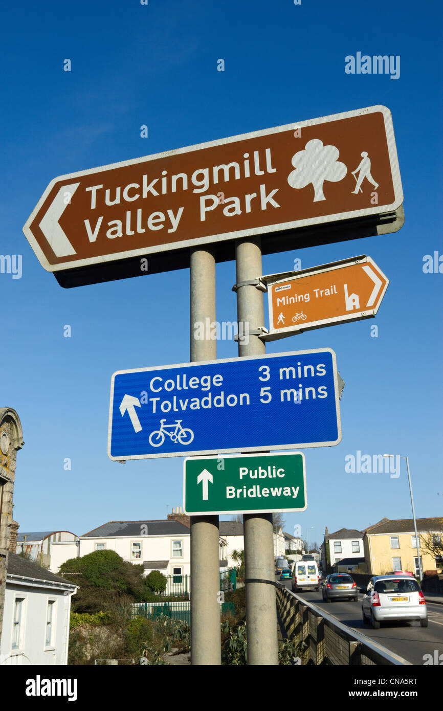 Cluttered signpost that's difficult to read while driving Stock Photo ...