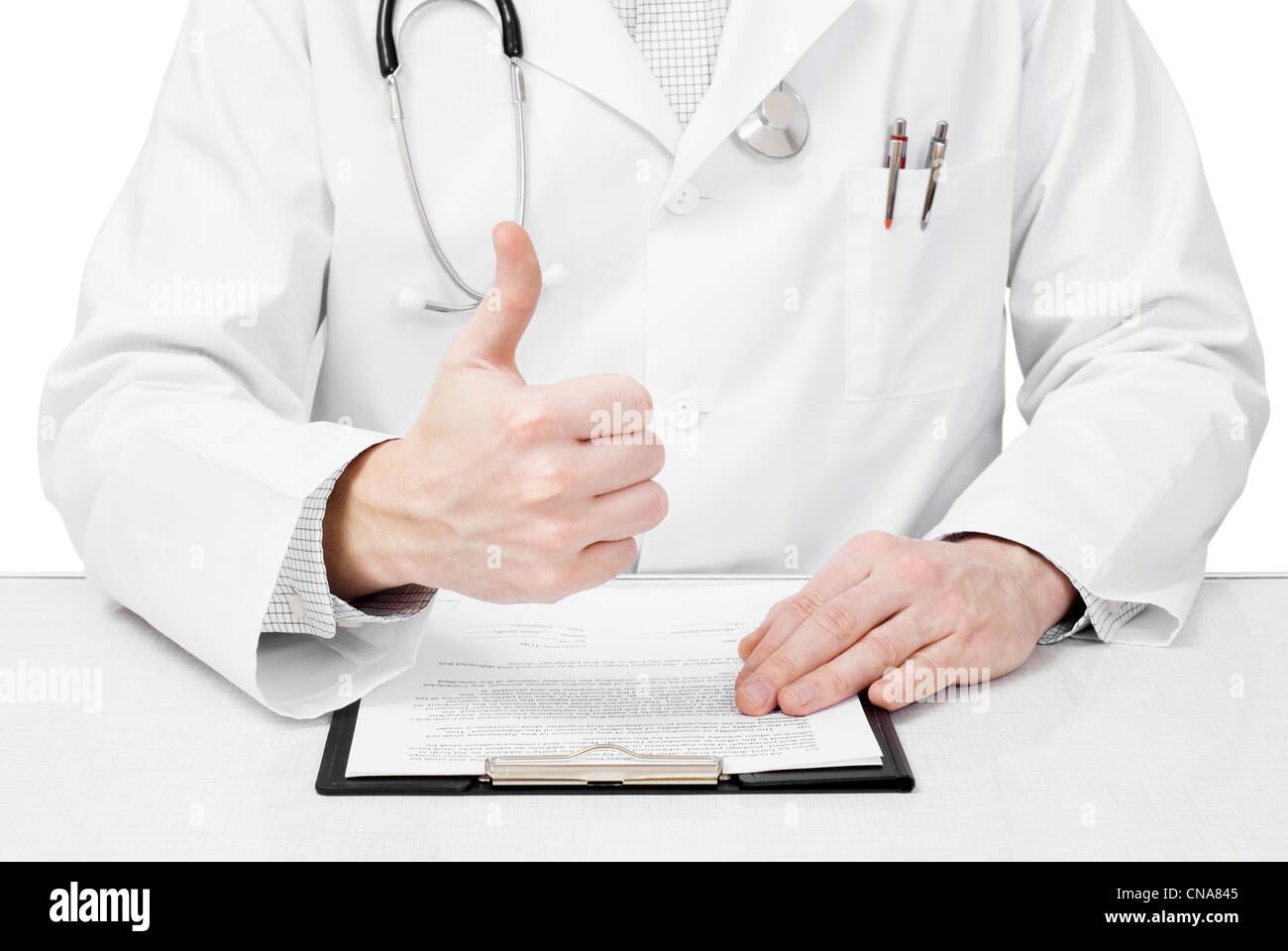 Young doctor showing ok sign with thumb up isolated on white background ...