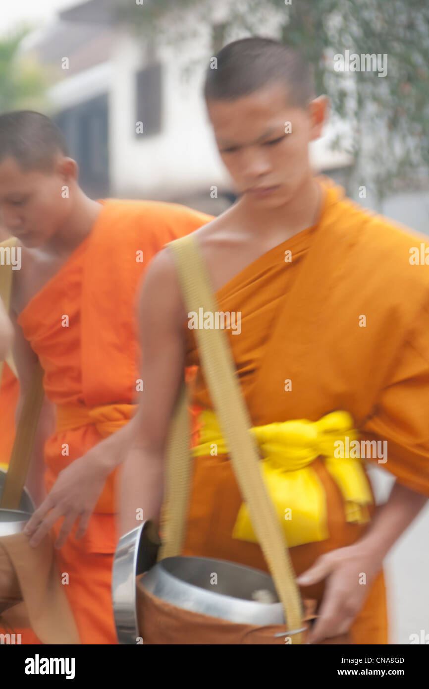 Buddhist monks collecting alms in hi-res stock photography and images ...