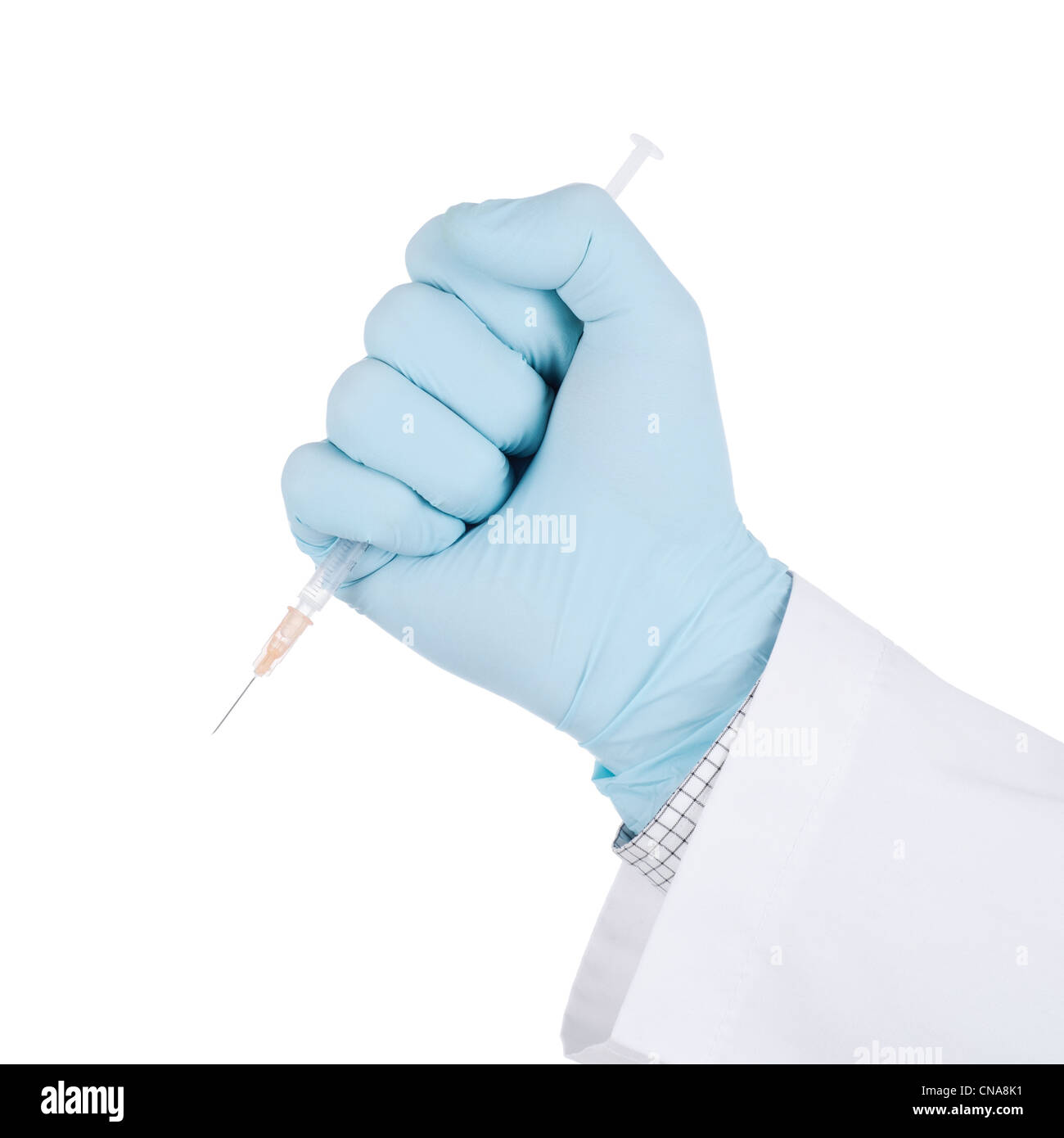 Syringe in doctors hand isolated on a white background - studio shot ...
