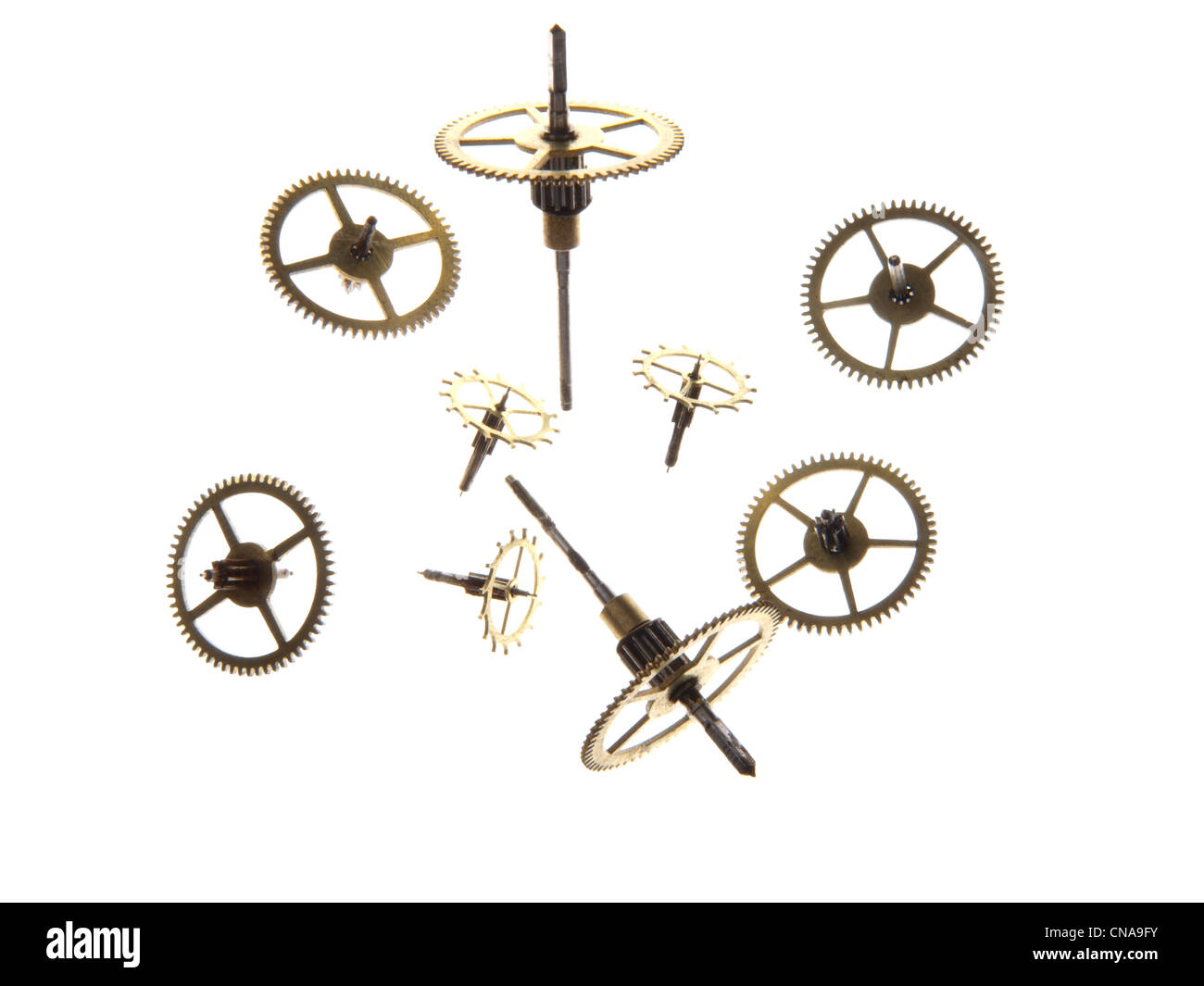 Varied little yellow gear isolated on white background Stock Photo - Alamy