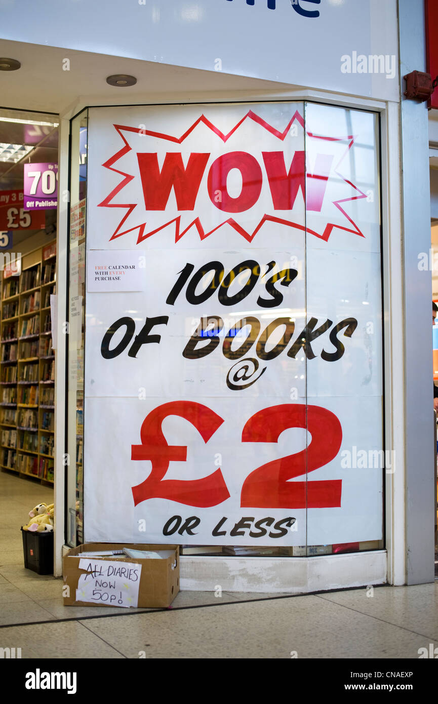 sale sign in a book shop (store) window reflecting the crisis in the ...