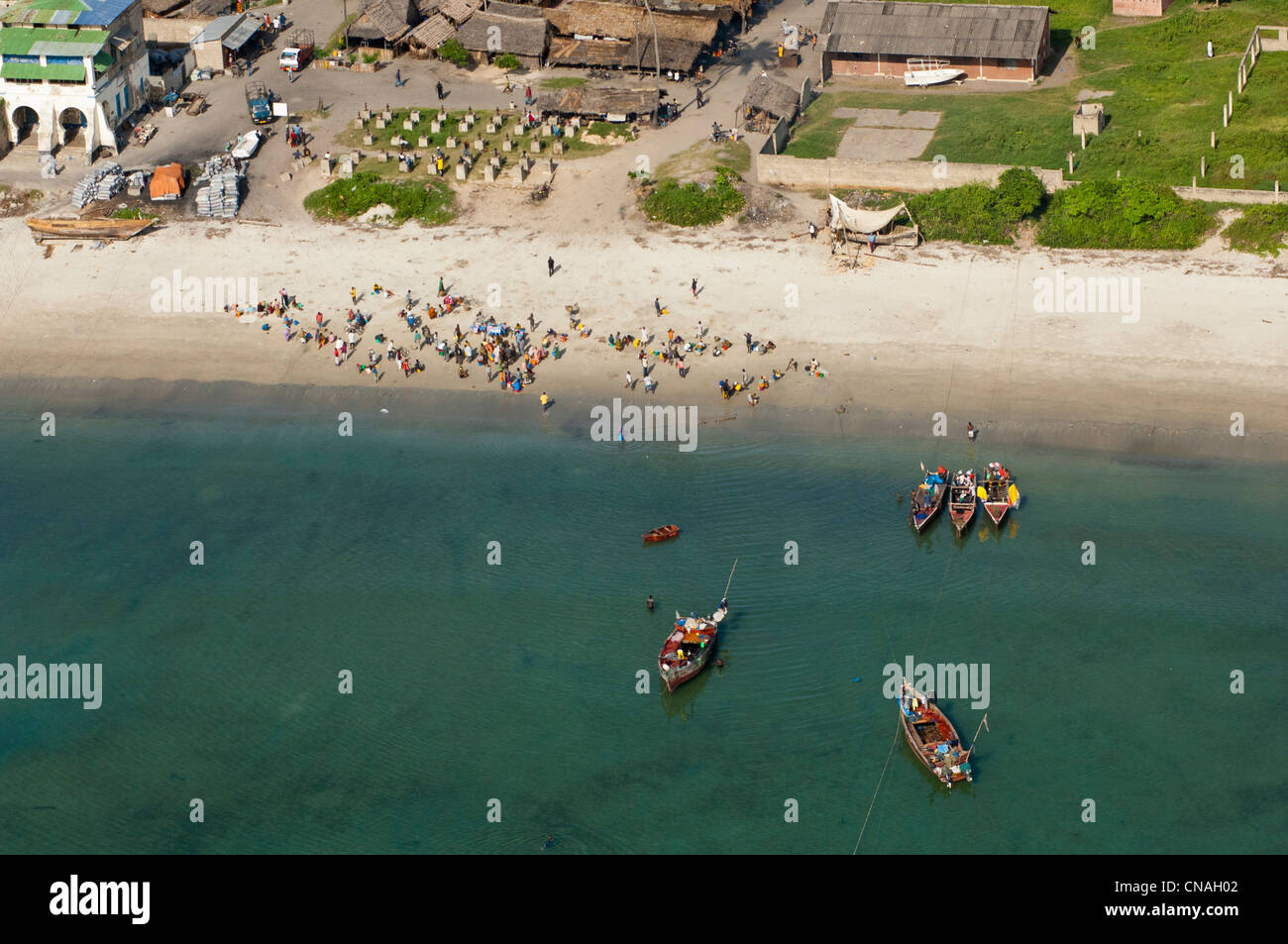 Villagers buying fish on the beach of Bagamoyo, aerial view, Pwani ...
