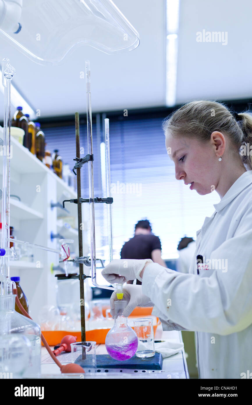portrait of a female researcher carrying out research in a chemistry ...