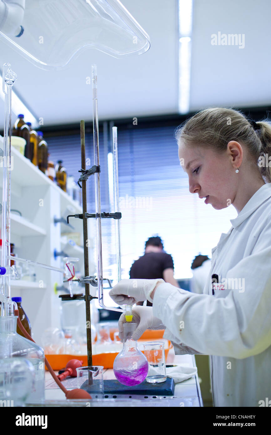 portrait of a female researcher doing research in a lab (color toned ...