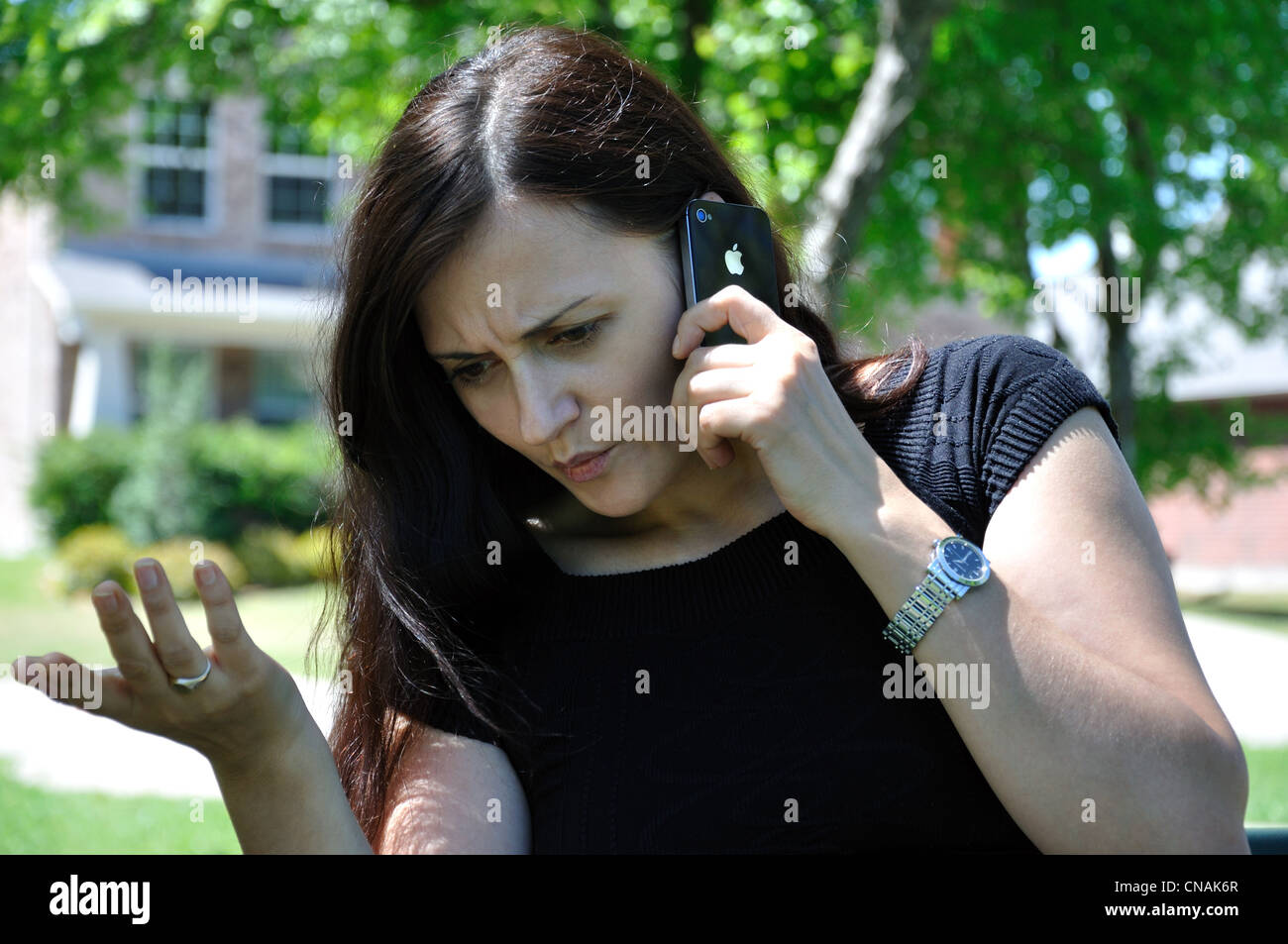 Girl with iphone Stock Photo - Alamy