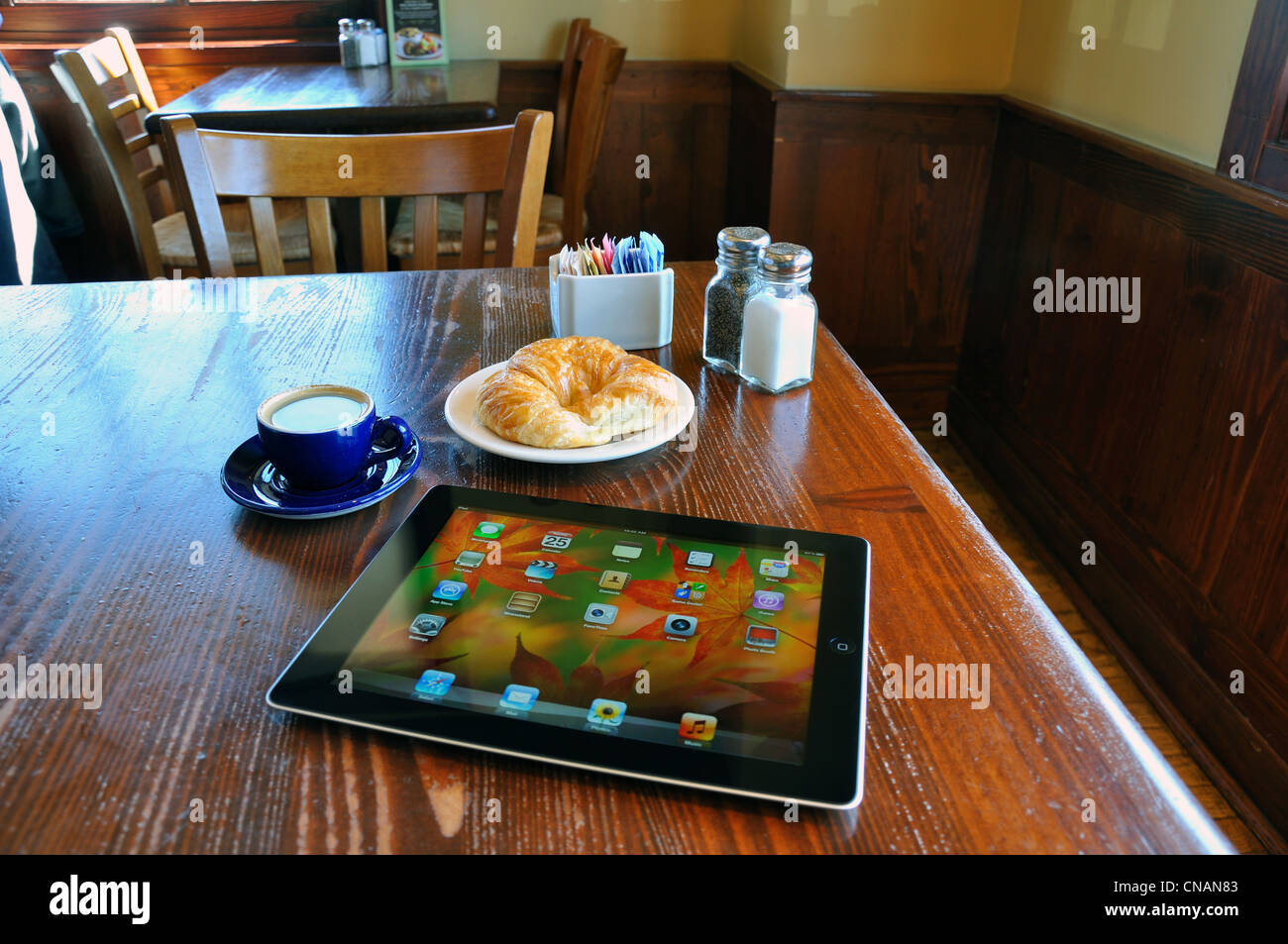 iPad in cafe Stock Photo - Alamy