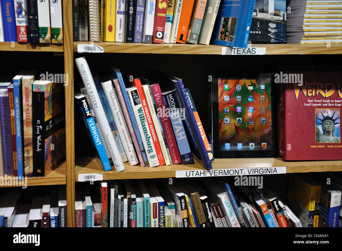 iPad among books Stock Photo - Alamy