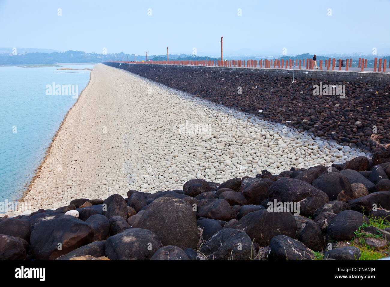 White pebble beach alongside reservoir in Chiayi Taiwan. JMH5960 Stock ...