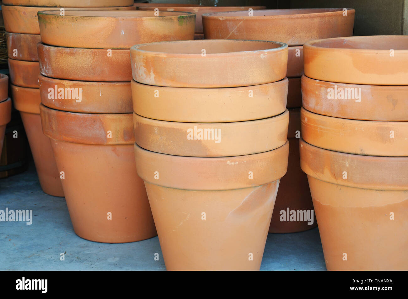 Stacked terracotta pots Stock Photo - Alamy