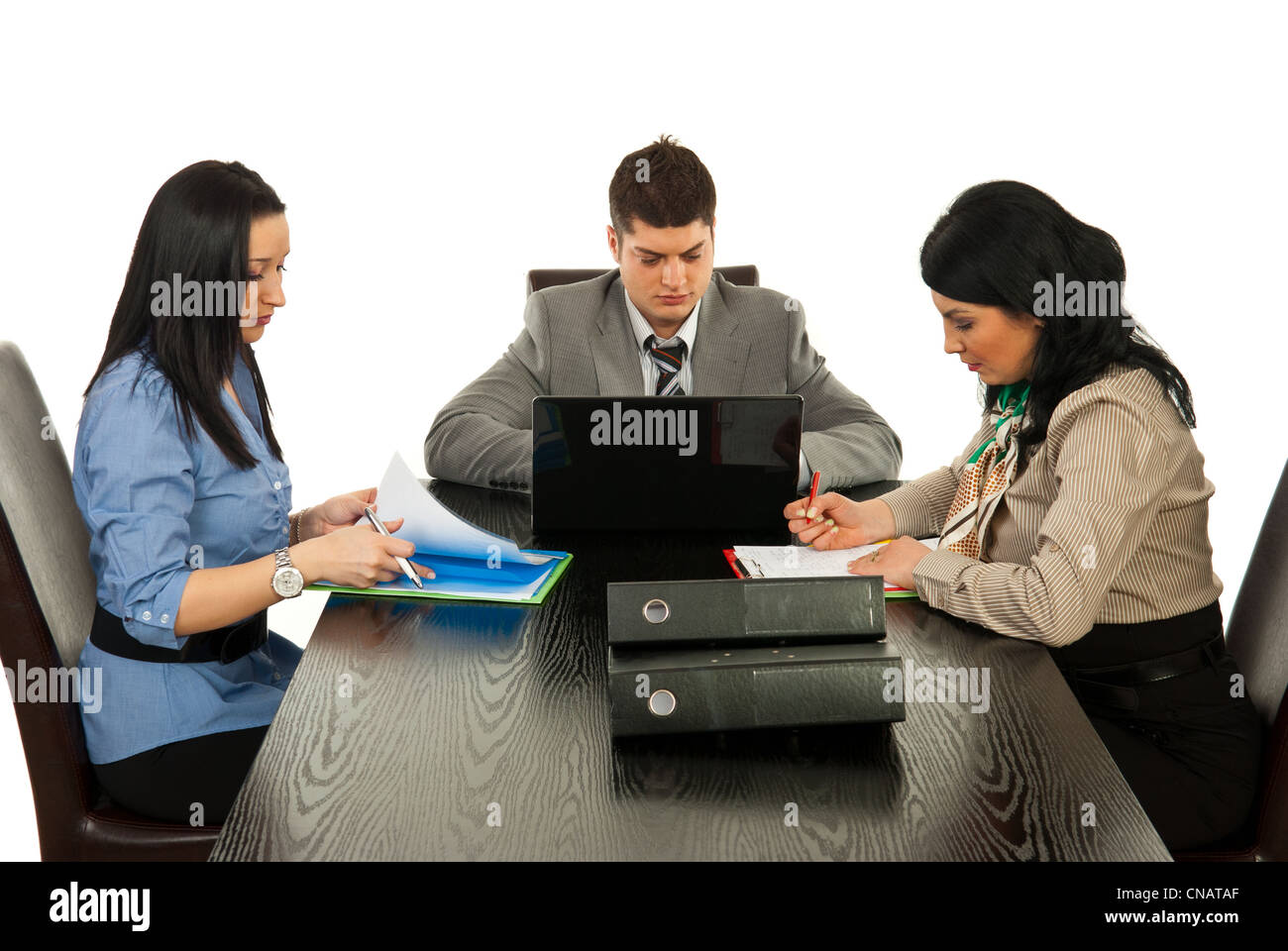 Three business people working in office against white background Stock ...
