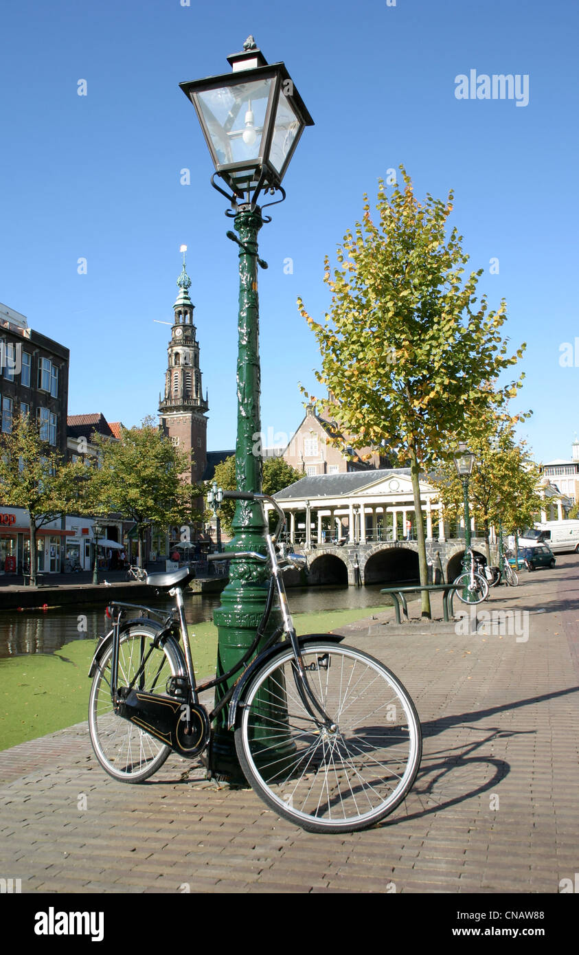 A dutch bicycle near a dutch canal Stock Photo - Alamy
