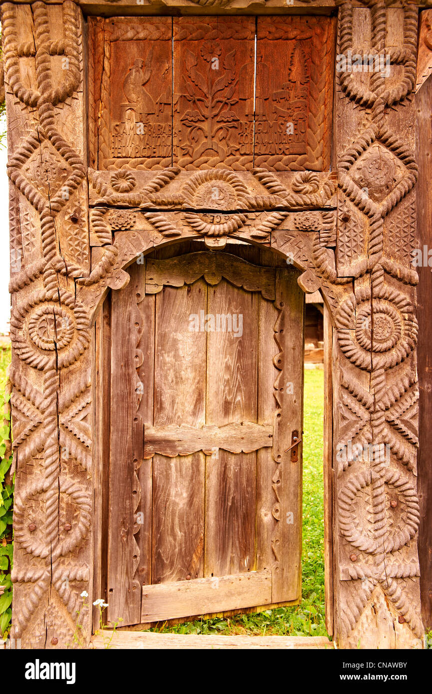 Traditional folk art carved farm gate near Sighet, Maramures, Romania ...