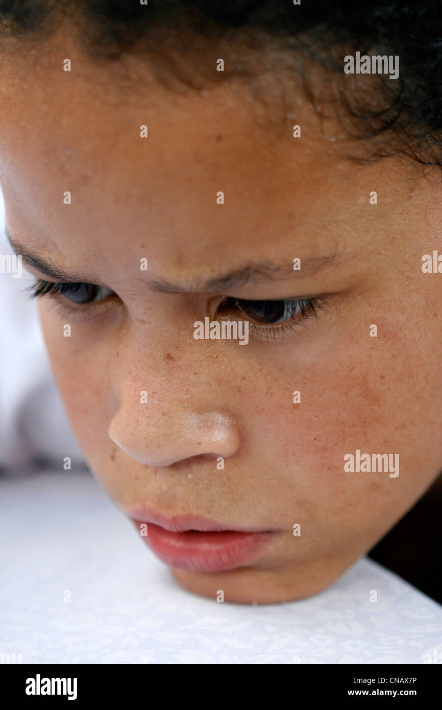 A young girl looking thoughtful Stock Photo - Alamy