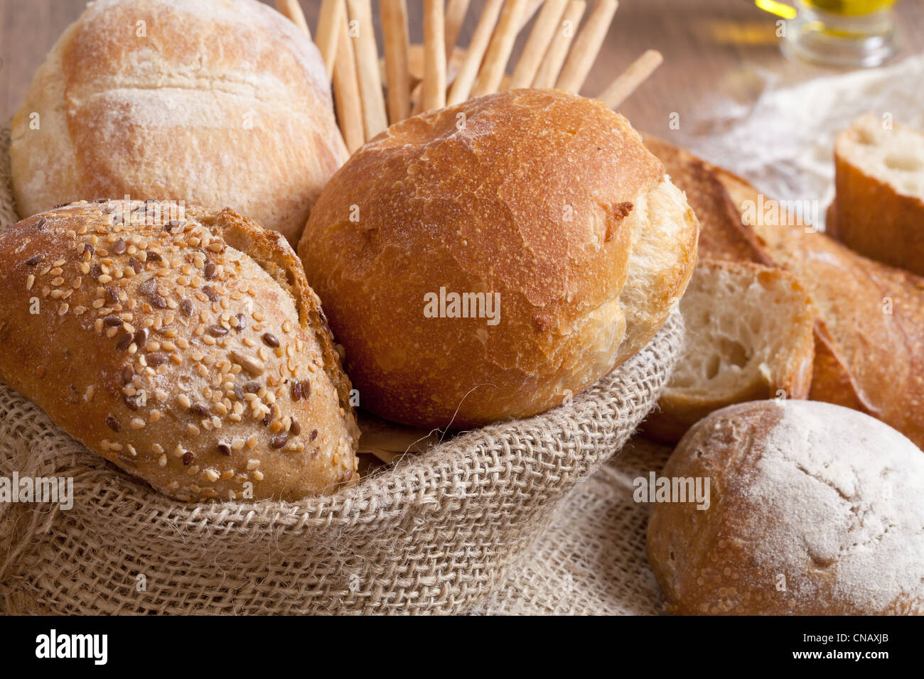Crusty fresh bread assortment background Stock Photo - Alamy