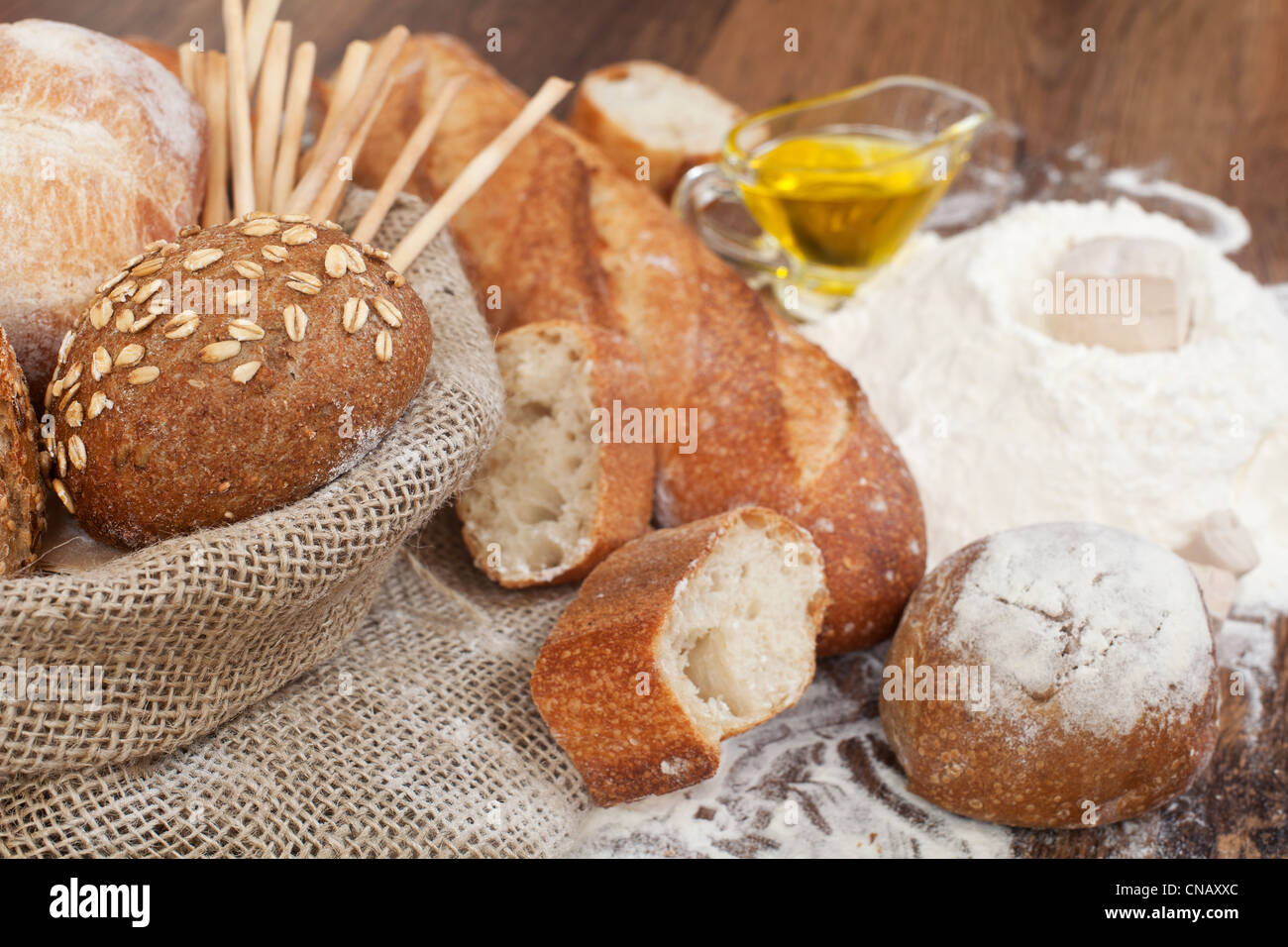 Crusty fresh bread assortment background Stock Photo - Alamy