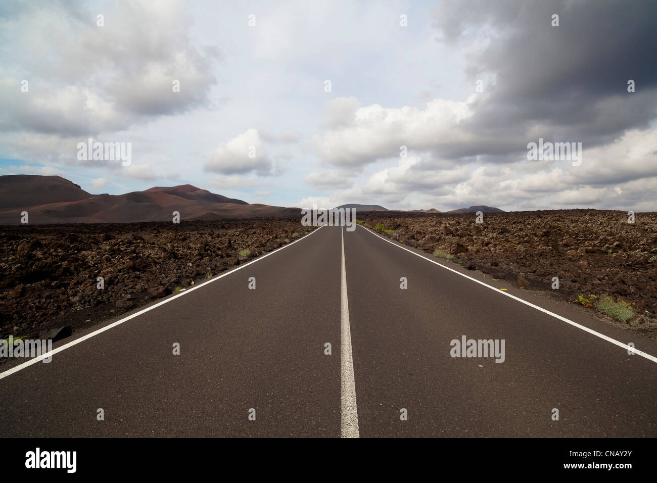 Paved road in rural landscape Stock Photo - Alamy