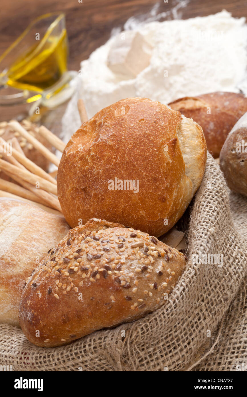 Crusty fresh bread assortment background Stock Photo - Alamy