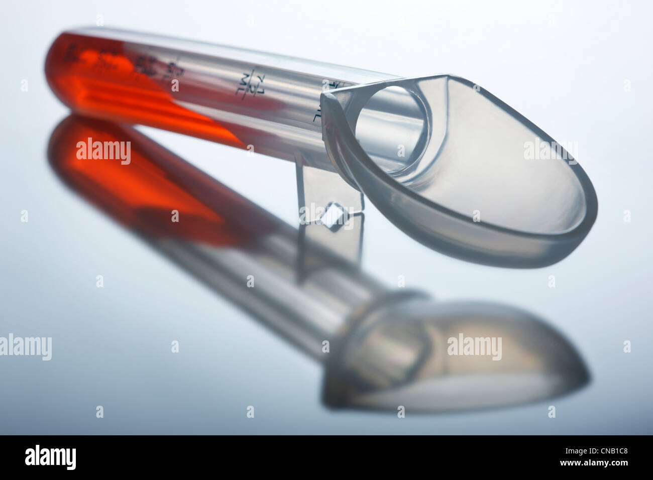 Cough syrup measuring spoon hi-res stock photography and images - Alamy