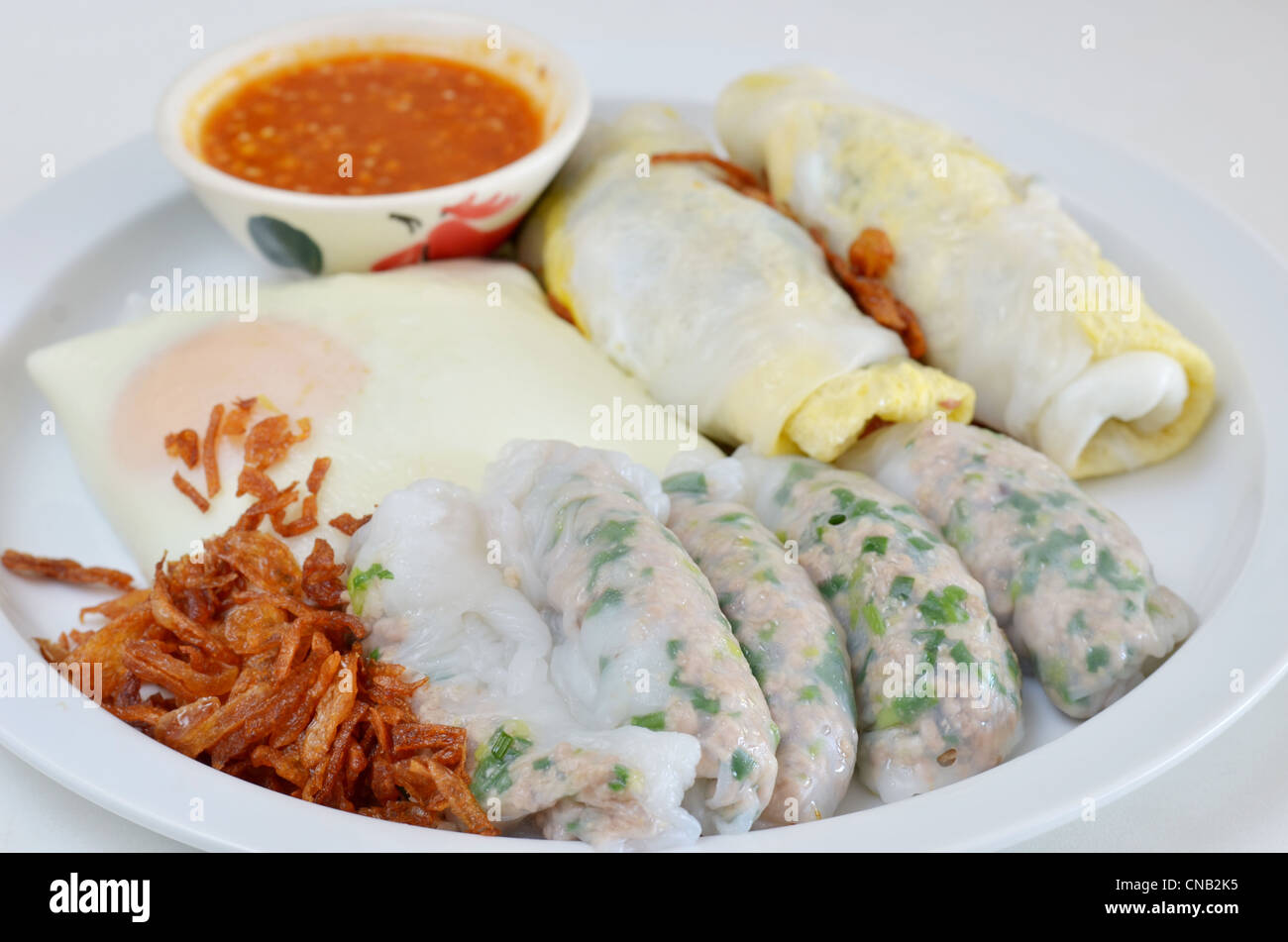 mixed vietnamese rice noodle rolls with a filling of pork sliced , egg ...