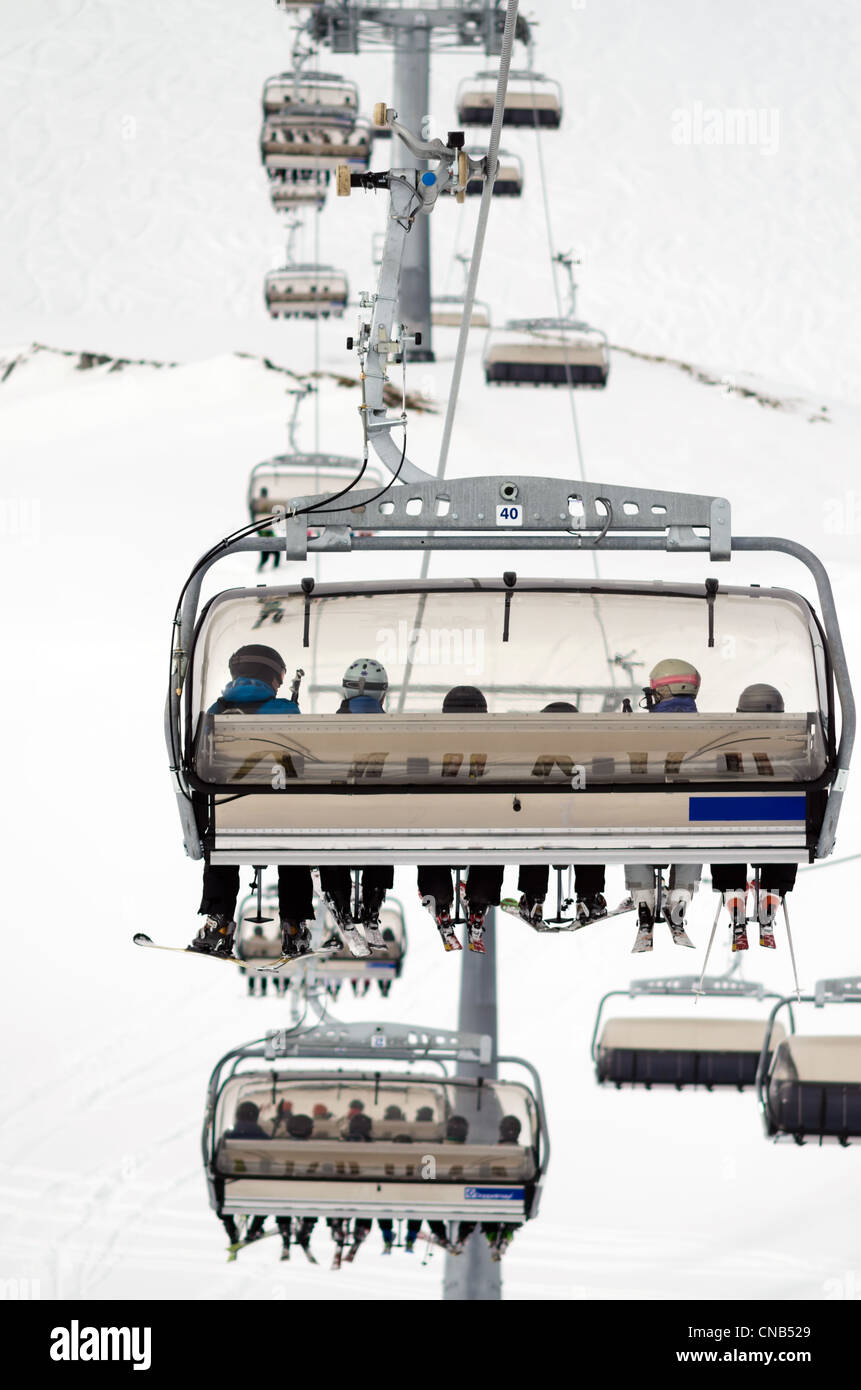 many cabins of a ski lift in the skiing area Stock Photo - Alamy