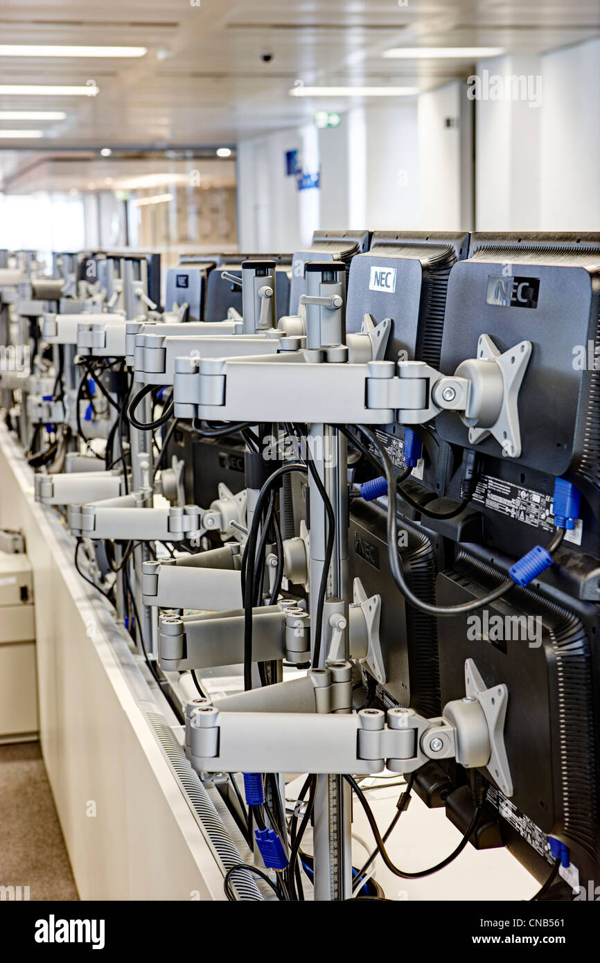 computer screens back support arms system office Stock Photo - Alamy