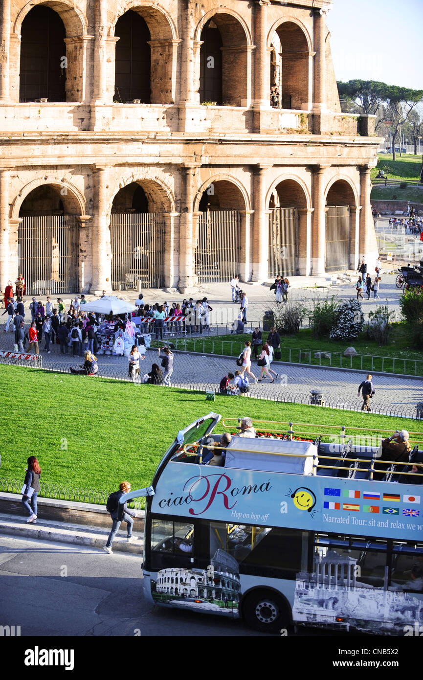 Sightseeing Bus Passing The Colosseum in Rome Stock Photo - Alamy