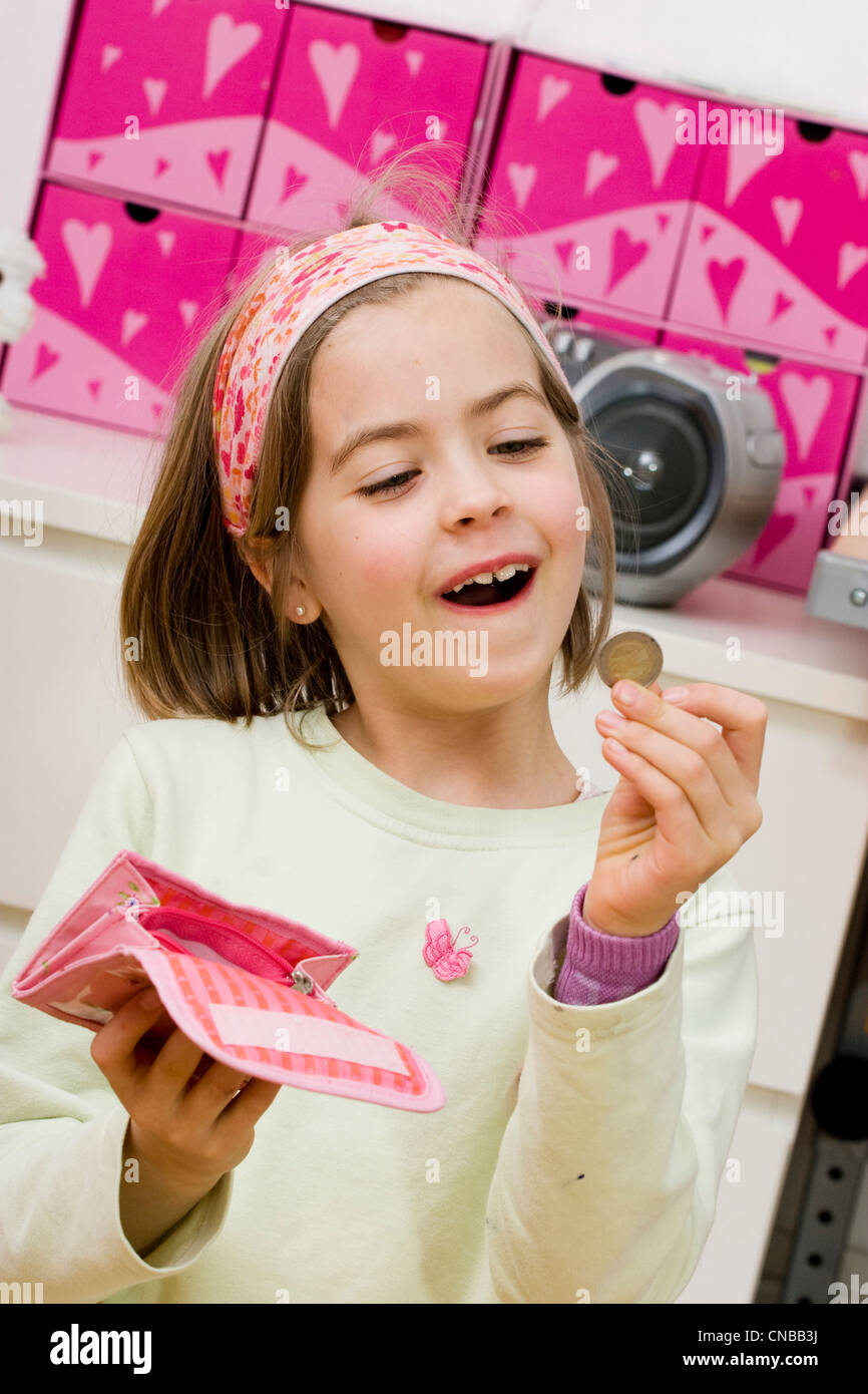 Child spending pocket money hi-res stock photography and images - Alamy