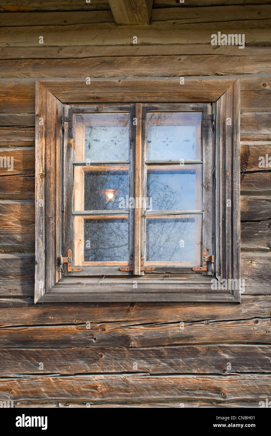 Rustic home with window reflection Stock Photo - Alamy