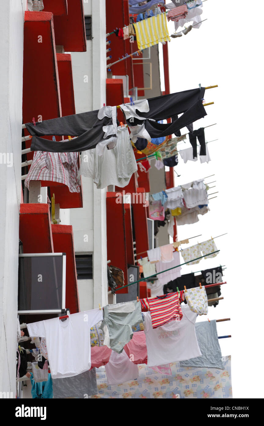 Singapore, clothes drying at the windows in residential buildings in ...