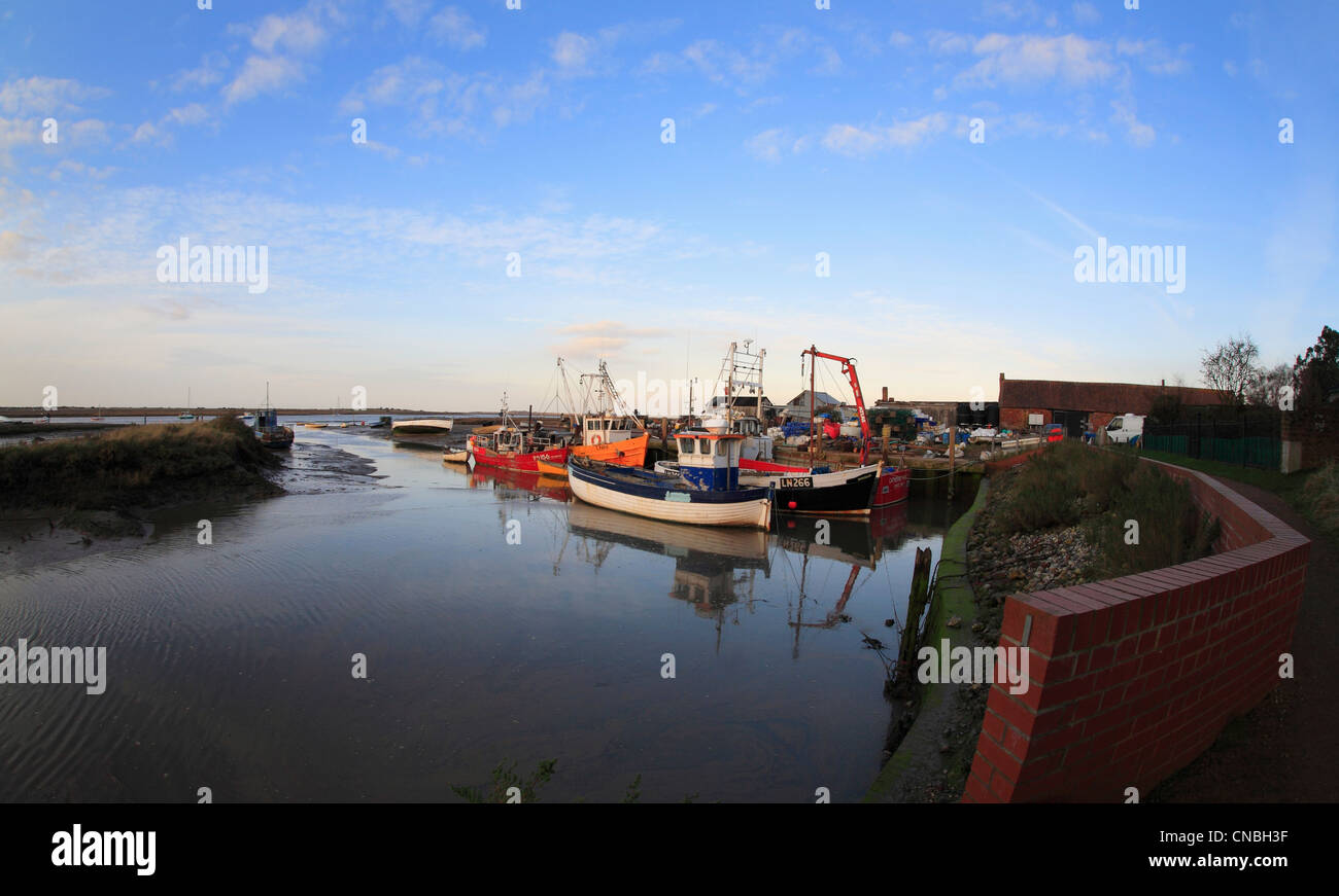 Fishing boats in the harbour at Brancaster Staithe on the North Norfolk ...