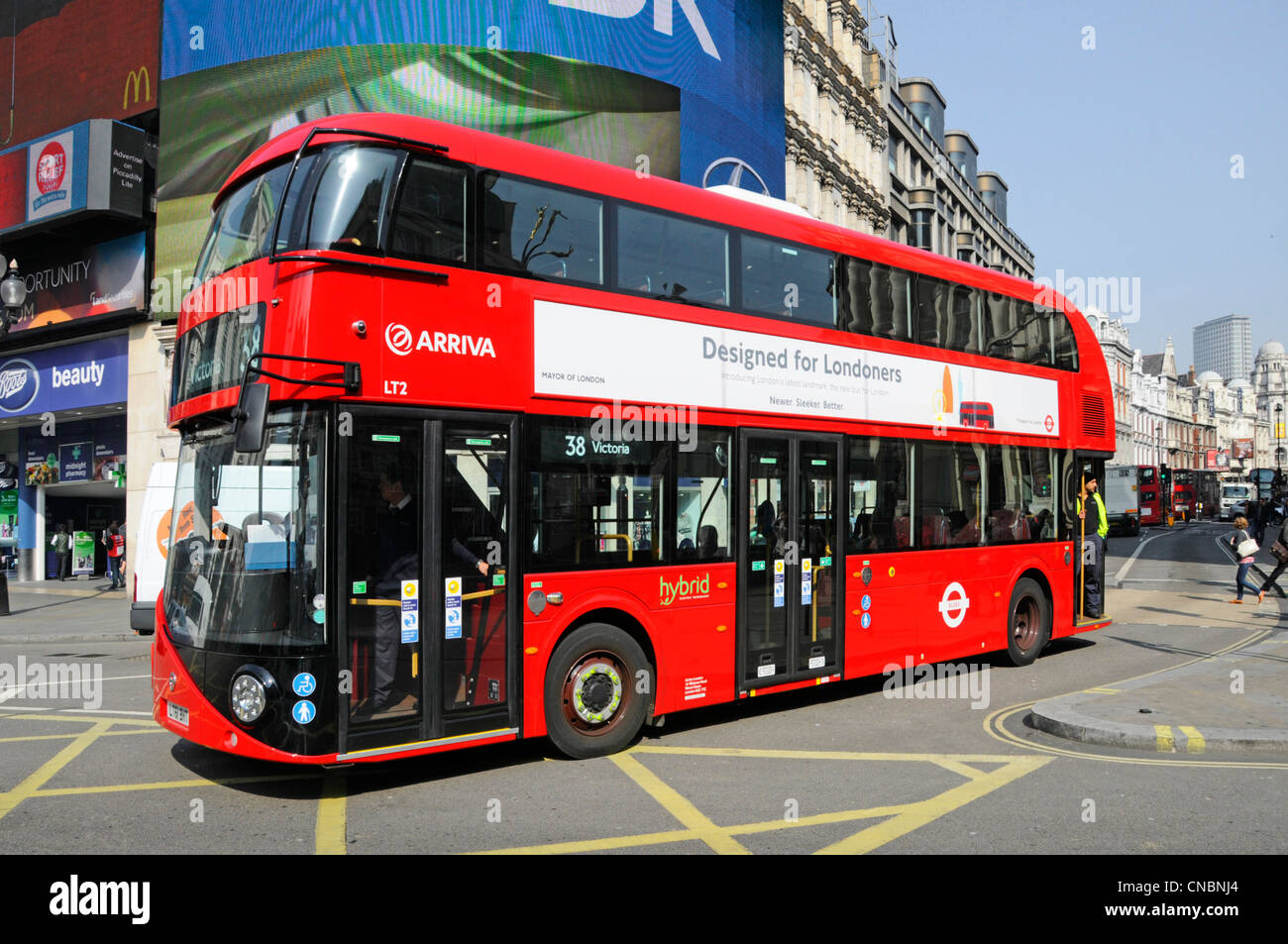 Side view new 2012 London bus referred to as a Routemaster or Boris bus ...