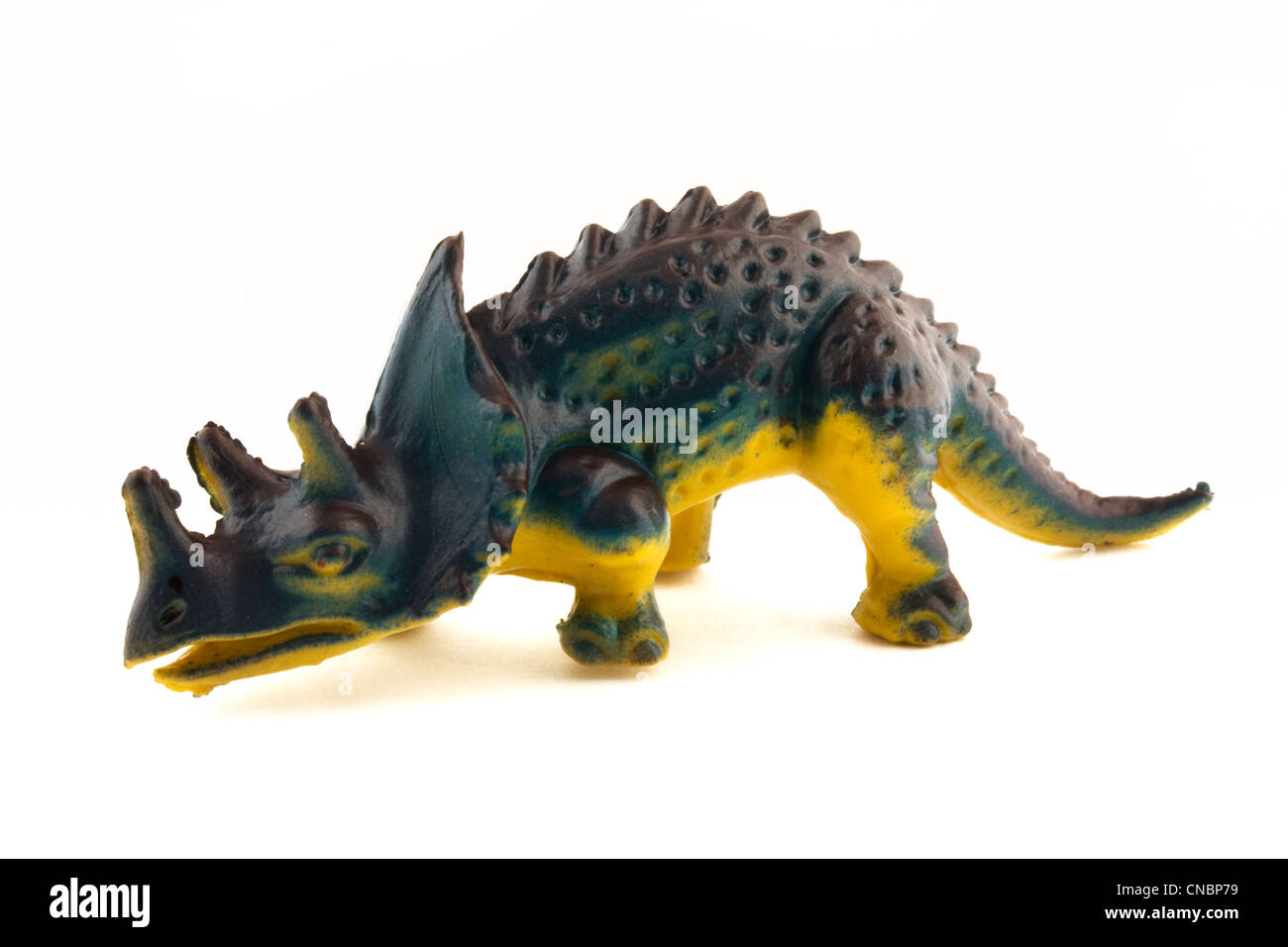 Toy plastic dinosaur over white Stock Photo - Alamy
