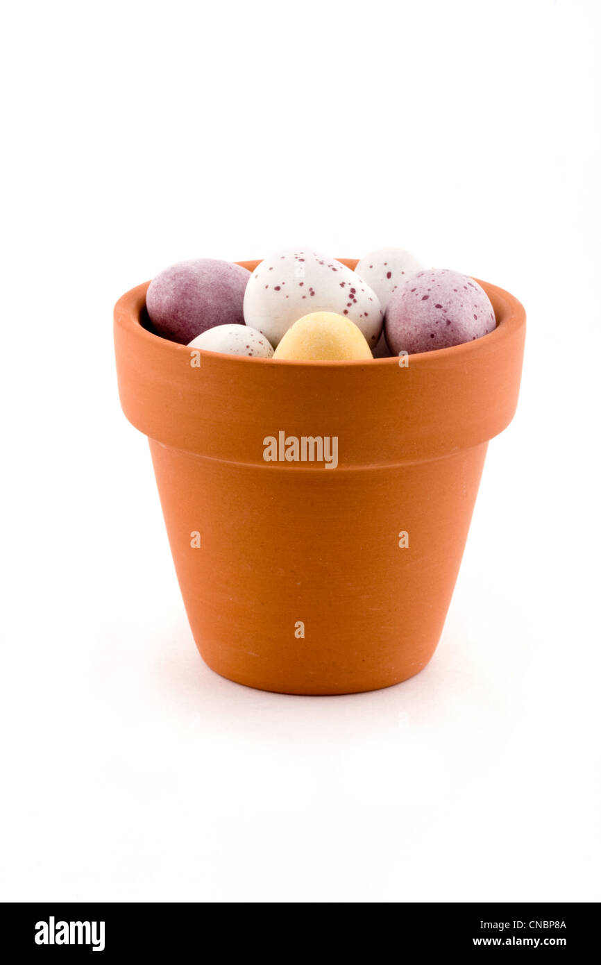 Pot of easter eggs on a white background Stock Photo - Alamy