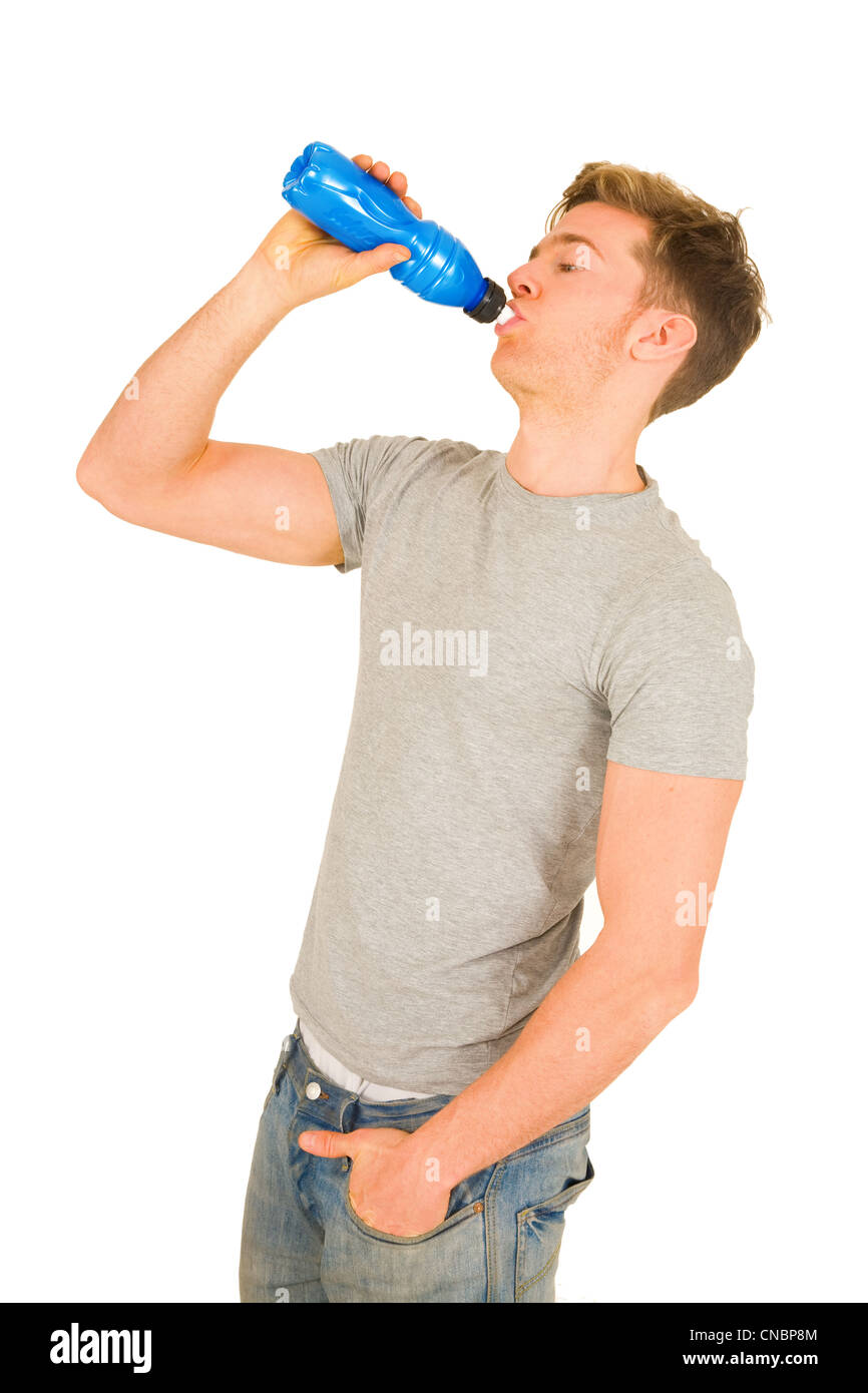young man drinking energy drink Stock Photo - Alamy