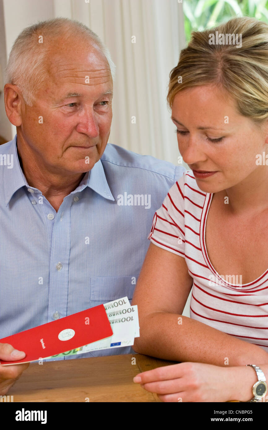 Parent Giving Child Money Euro High Resolution Stock Photography and ...