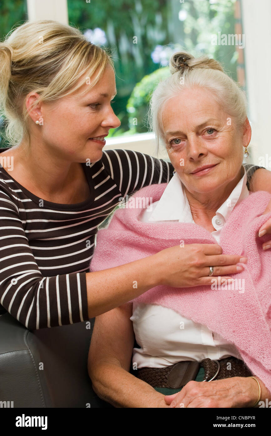 Caregiving daughter mother hi-res stock photography and images - Alamy