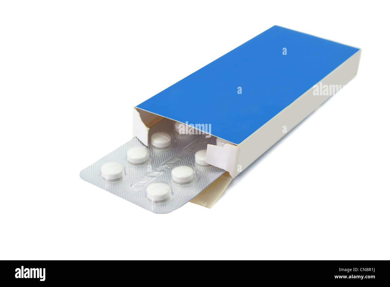 Pills tablets in open package on white background Stock Photo - Alamy