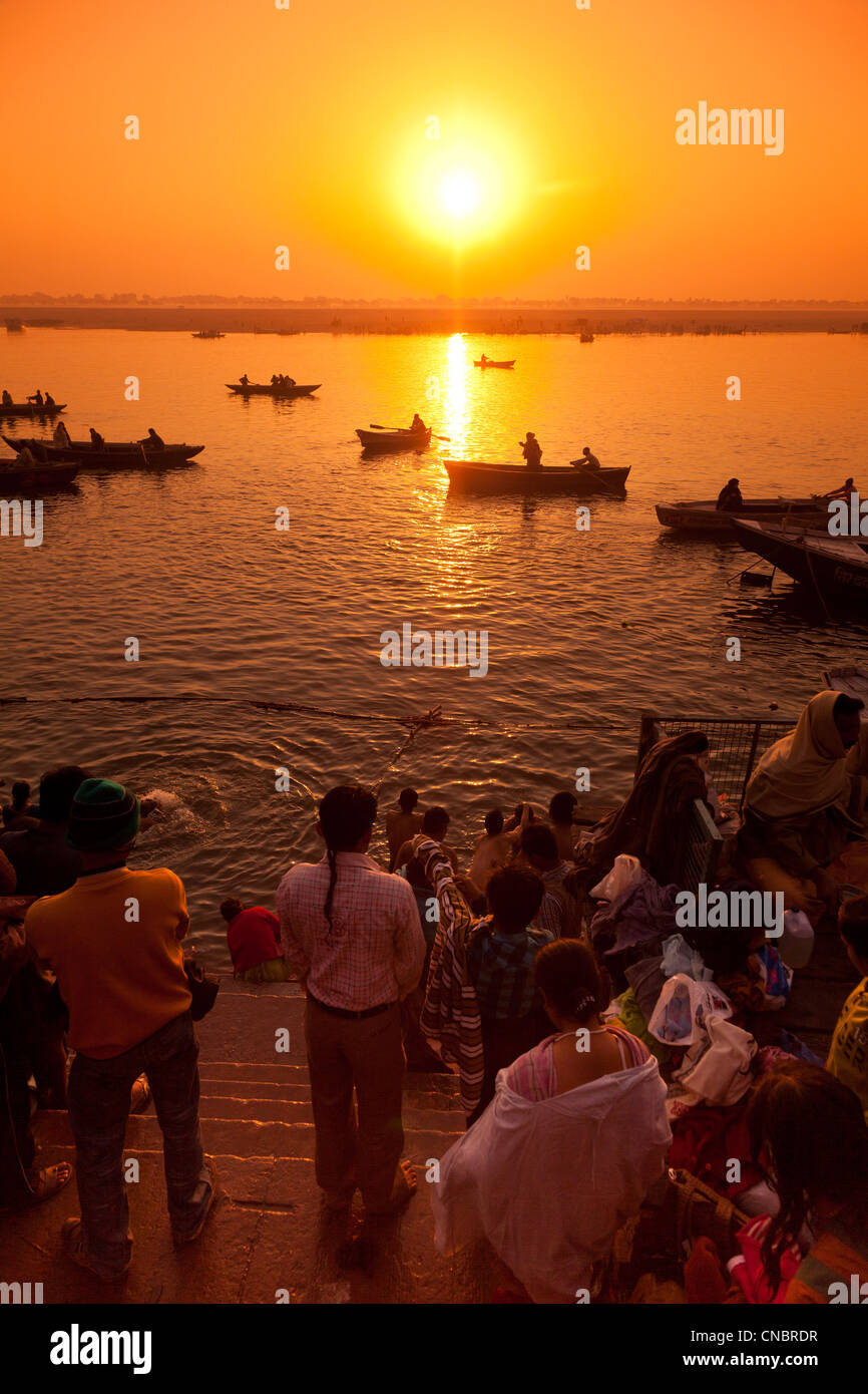 India, Uttar Pradesh, Varanasi, sunrise over the Ganges River Stock ...