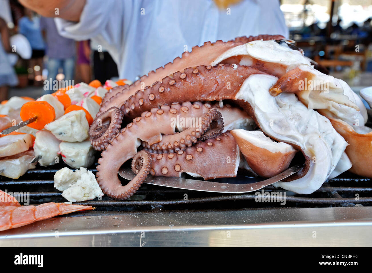Europe Greece Cyclades Santorini A fish barbecue in a tavern along the ...