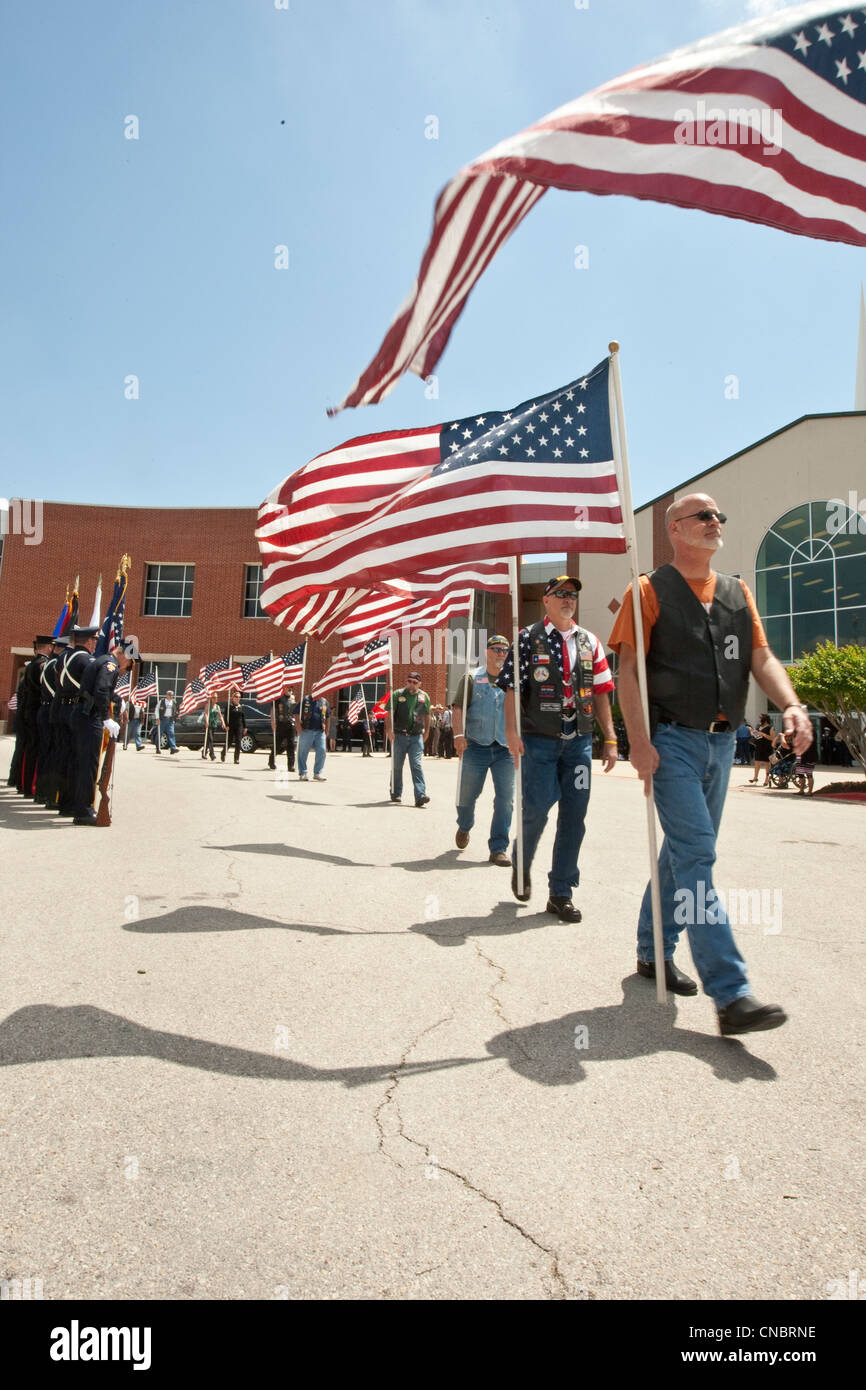 US veterans with flags at funeral for Austin Police Officer who was ...